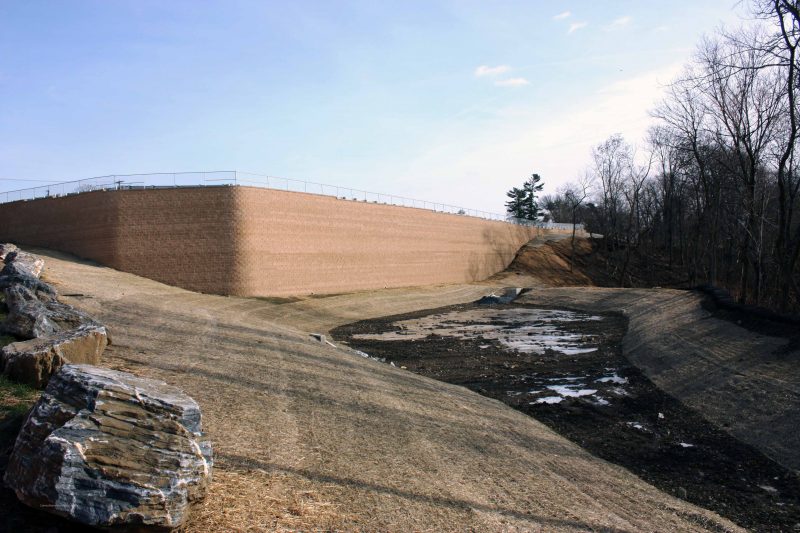 Tall CornerStone Retaining Wall Helps Develop Commercial Infrastructure