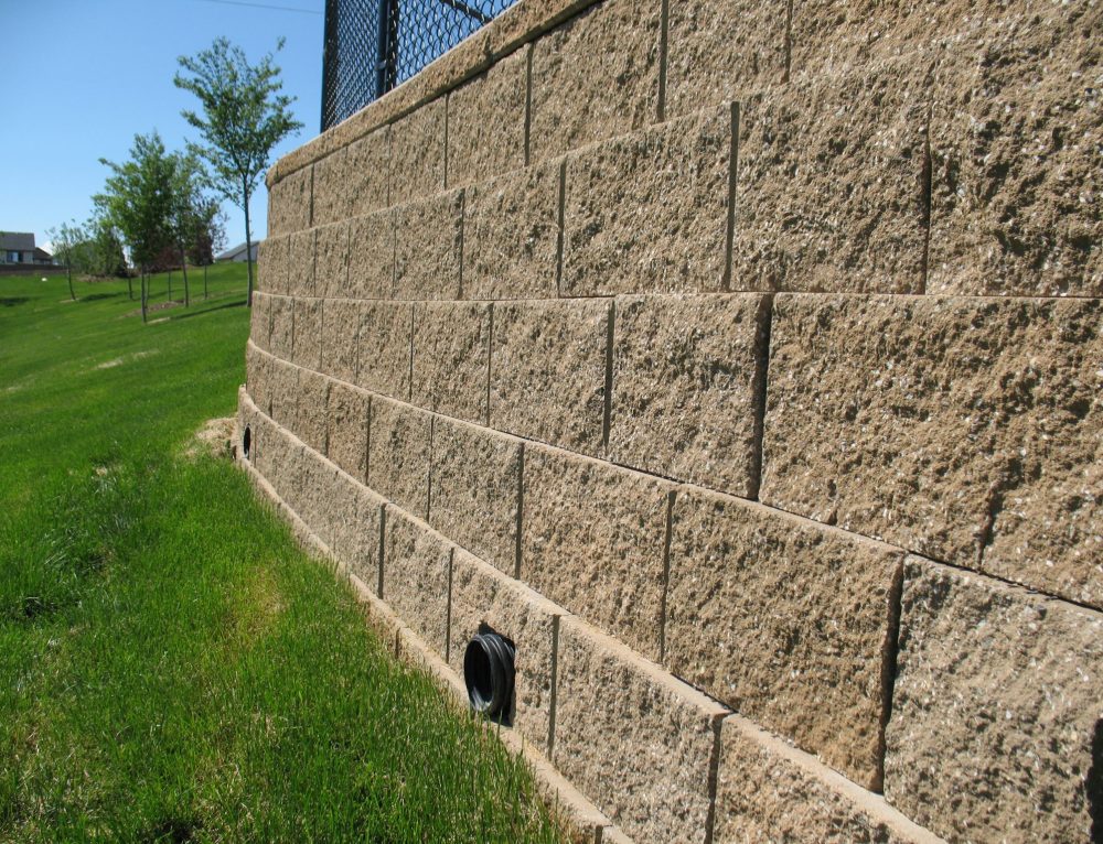 Replacing Old Wood Retaining Walls with Cornerstone Blocks